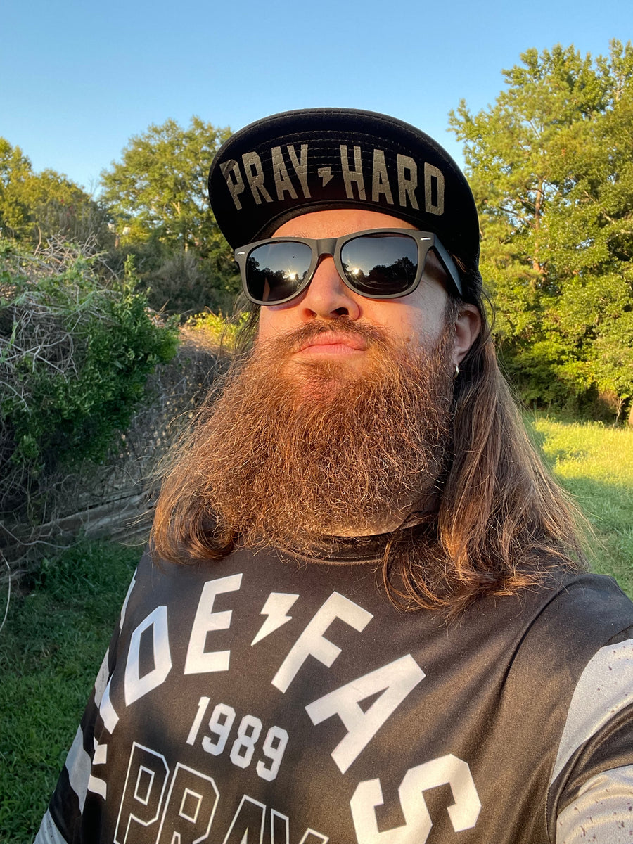 Ride Fast Pray Hard Flat-Out Trucker Hat